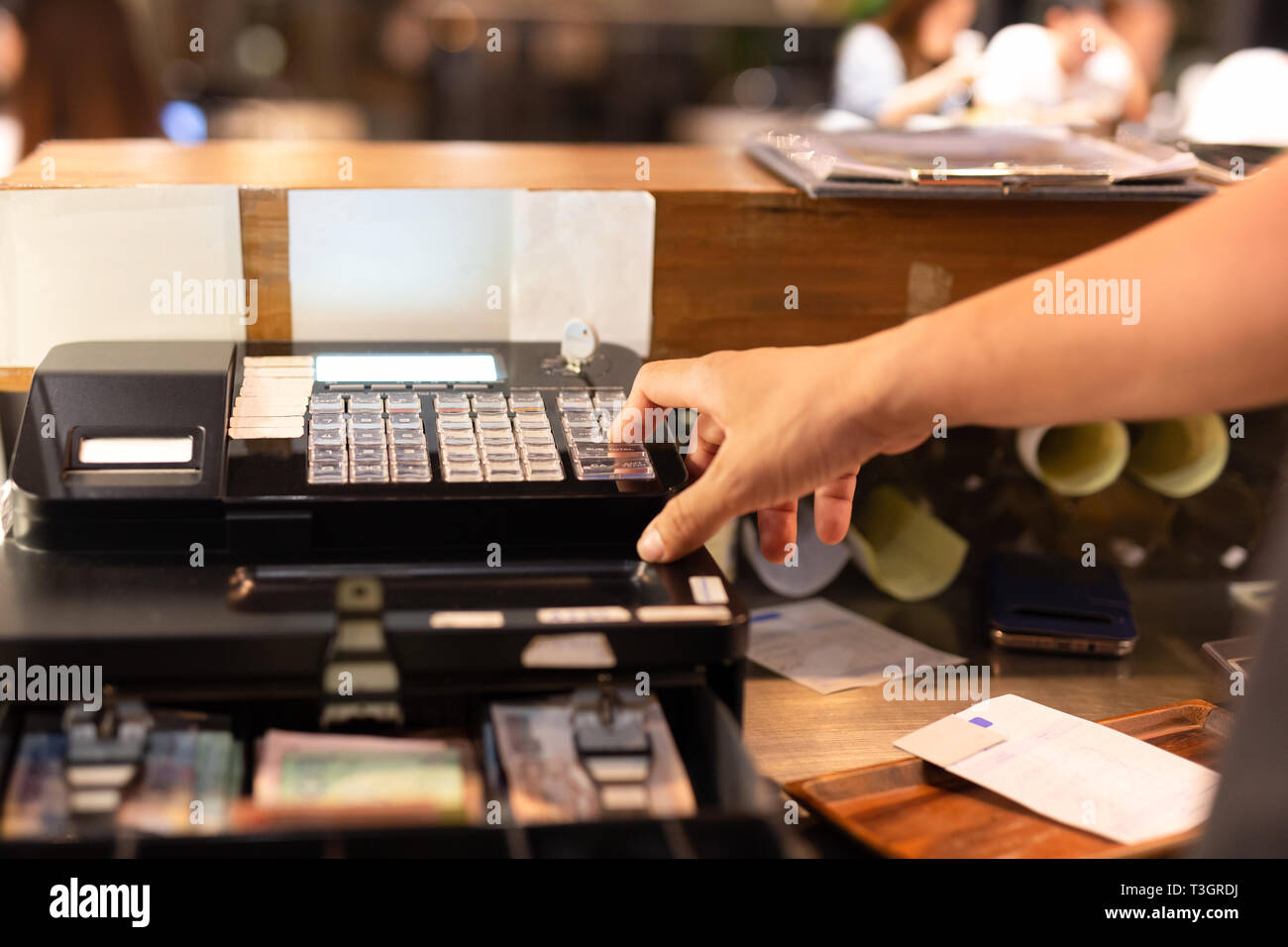 Man Cash Register High Resolution Stock Photography and Images - Alamy