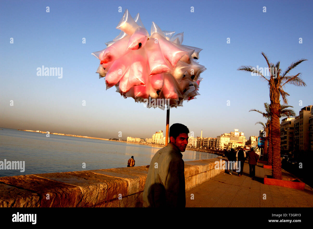 A man selling candy floss on the sea front, Alexandria, Egypt Stock ...