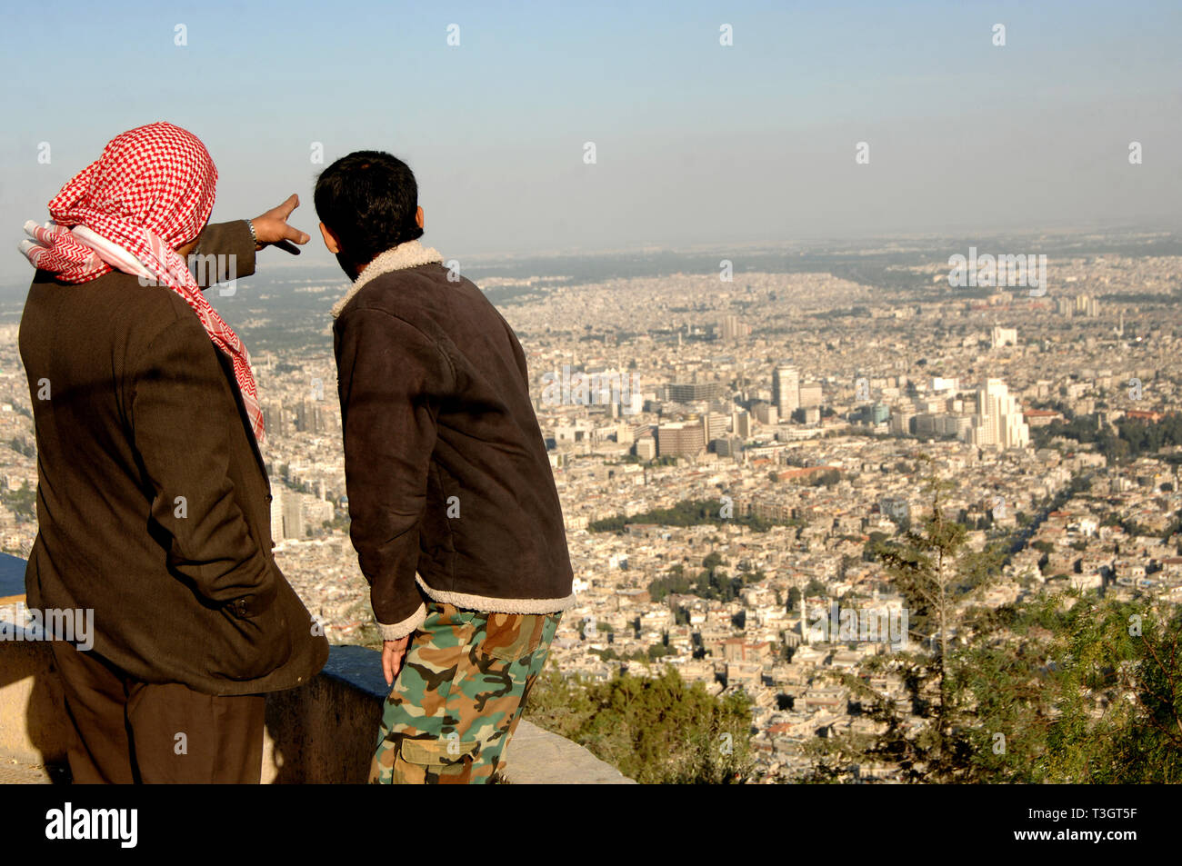 Syrian men enjoy the view from Mount Qasyun Stock Photo - Alamy