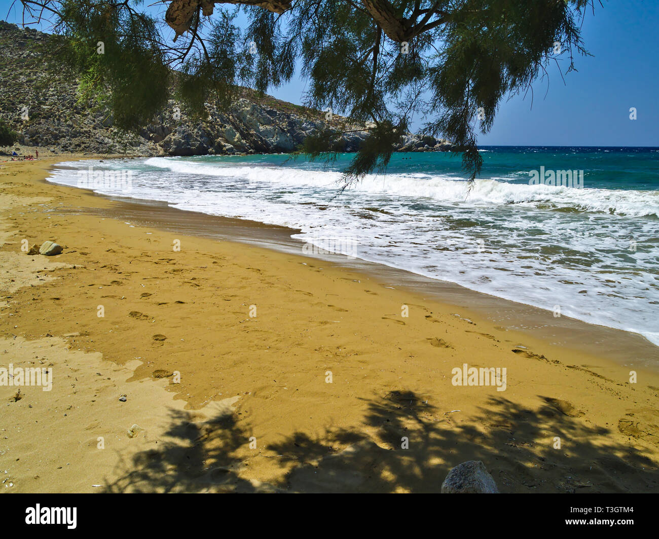 Beautiful greek summer sunny beach bay. View to aegean blue sea with awesome turquoise water ...