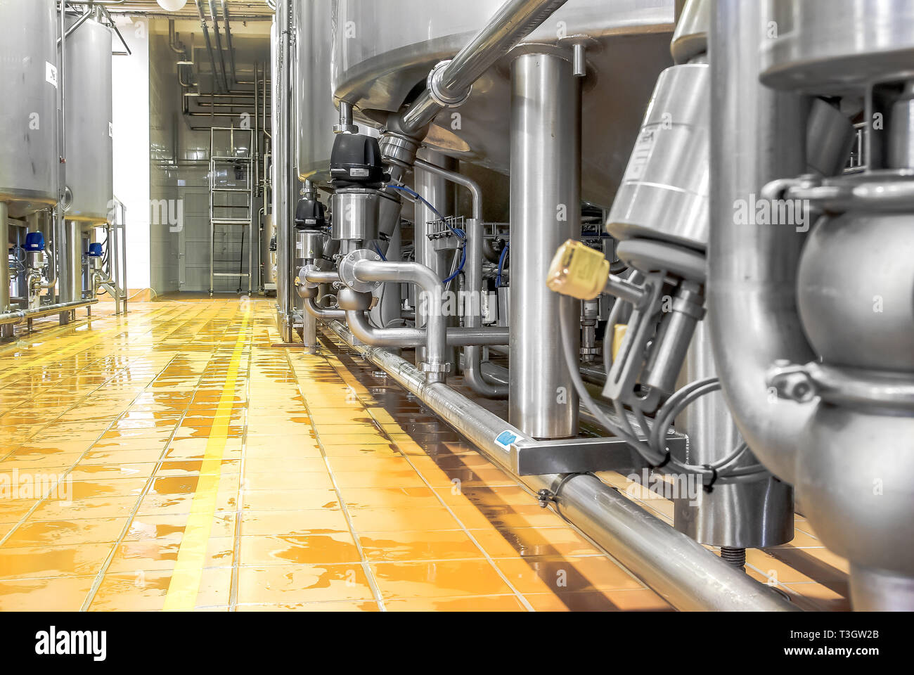 Stainless steel pipes in the factory. Construction on food production ...