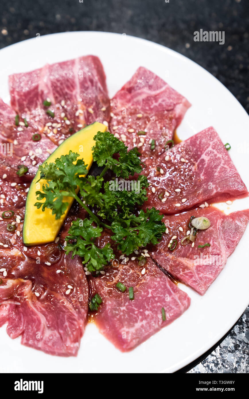 Raw premium wagyu beef meat for japanese yakiniku Stock Photo - Alamy
