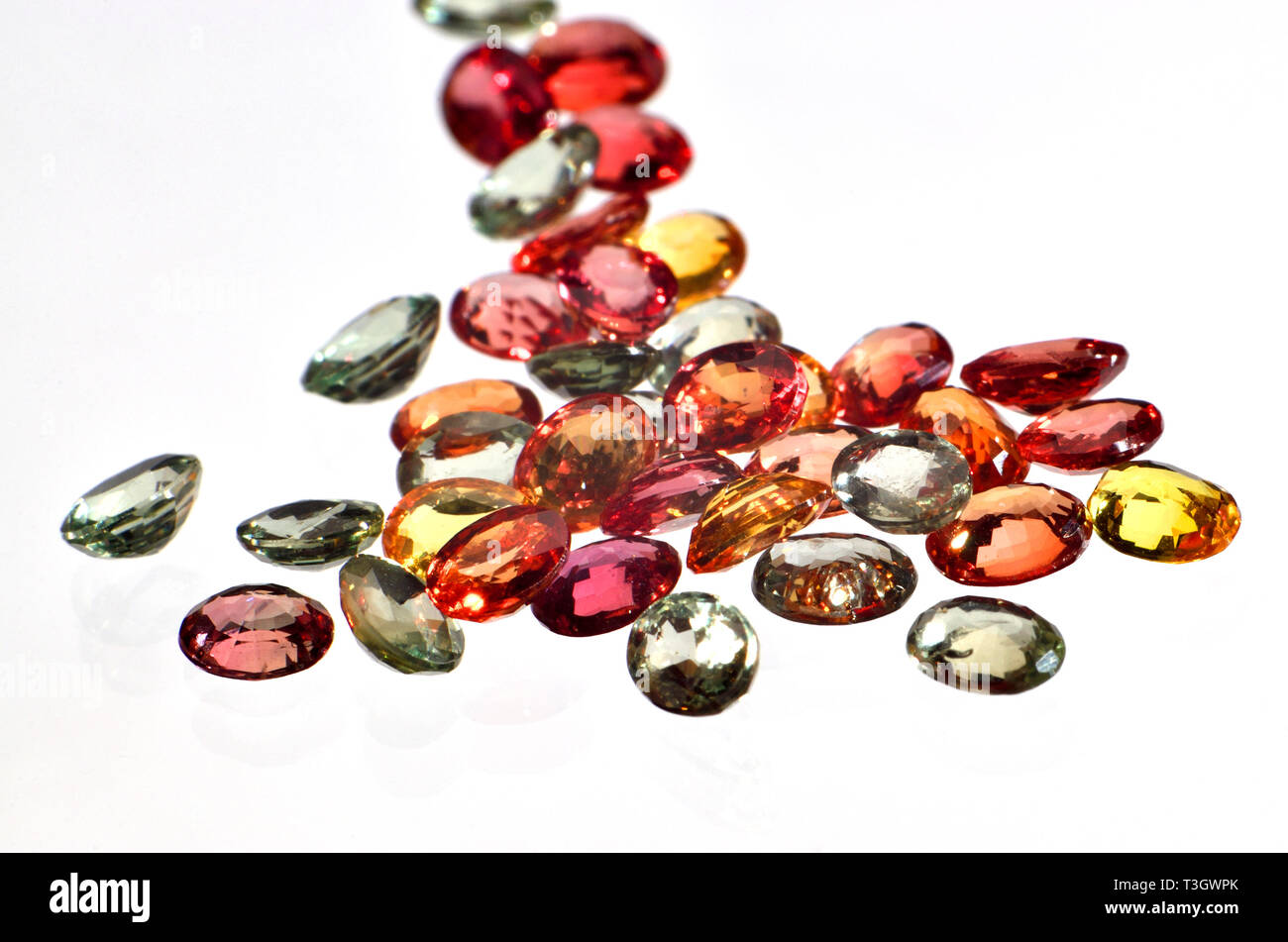 Small Natural Sapphires of different colours - red, yellow, orange and ...