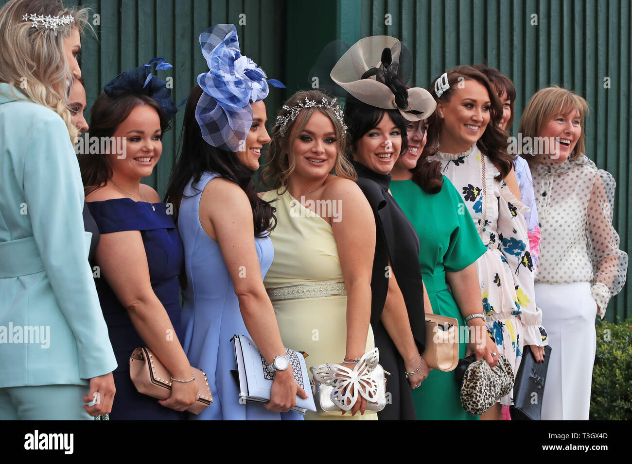 Glamorous racegoers pose for a photograph on day one of the 2019 Randox ...