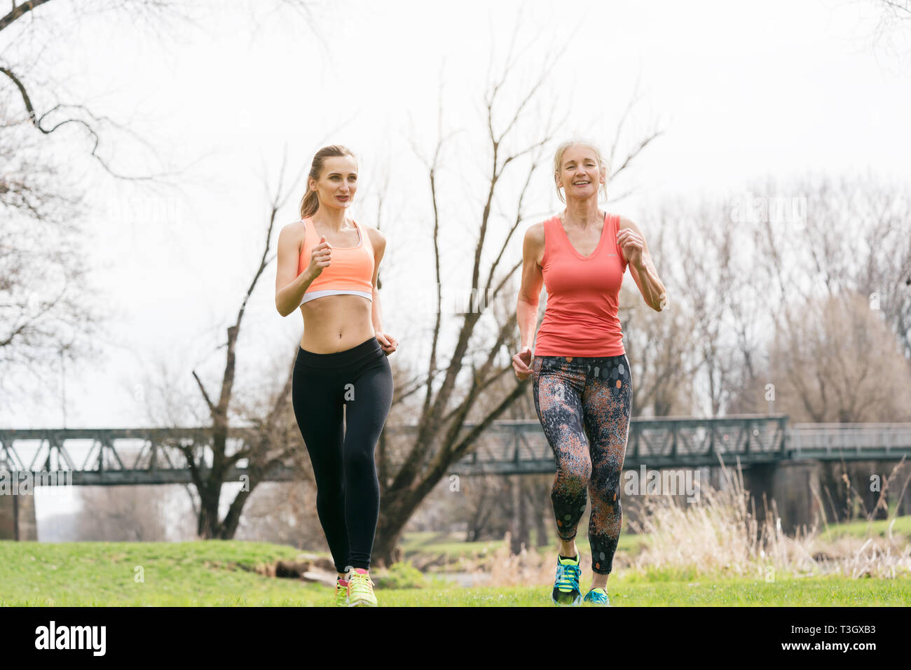 Woman running spring hi-res stock photography and images - Alamy