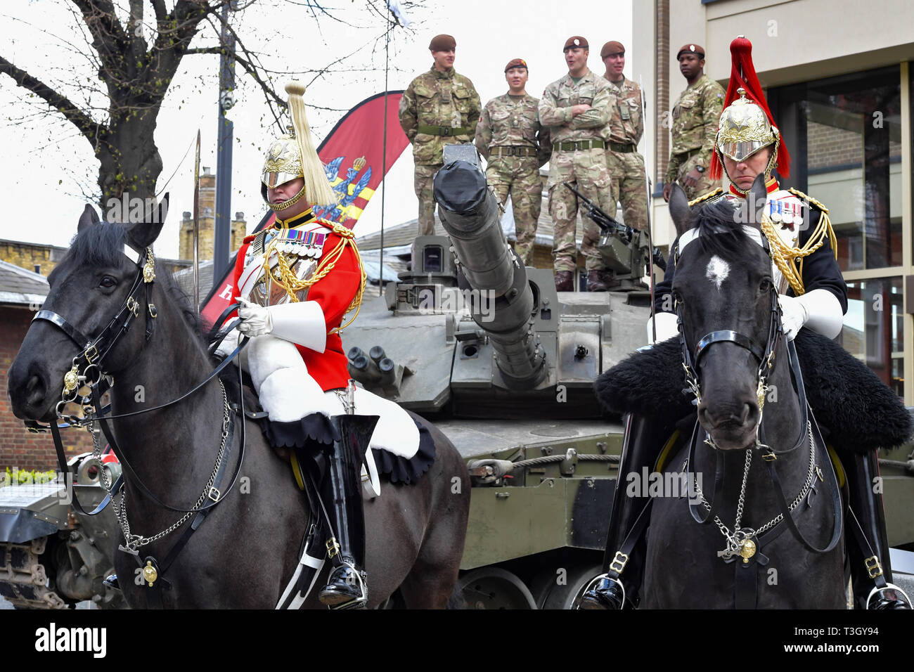 Two mounted soldiers from The Household Cavalry stand next to a ...