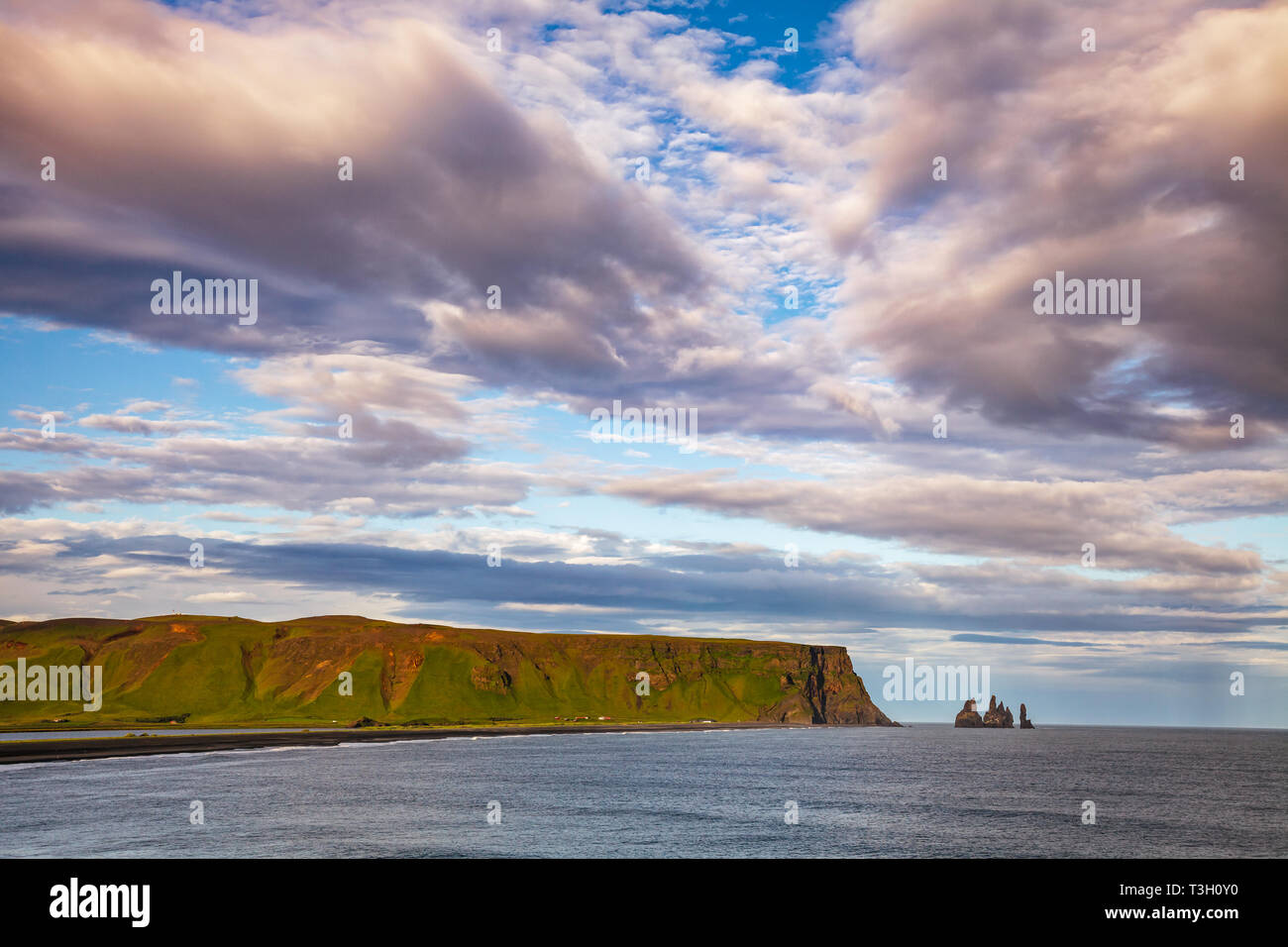 Reynisdrangar basalt sea stacks on the Reynisfjara black volcanic sand ...