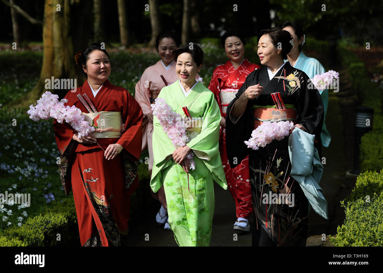 Members of the Odorikko dance group enjoy a walk on the grounds of ...