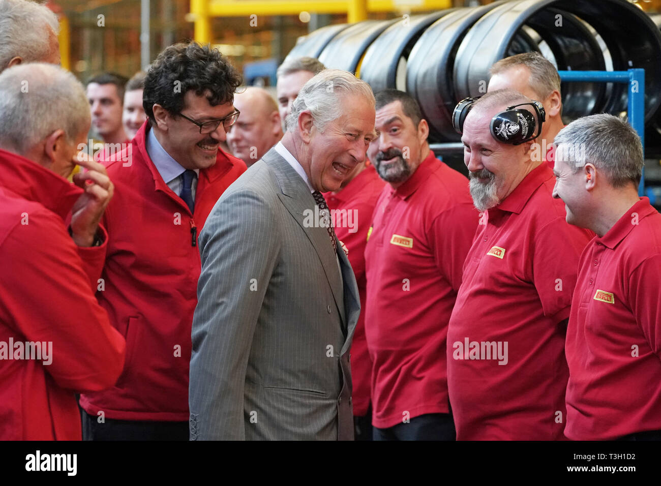 The Prince of Wales meets workers during his visit to Pirelli Tyres Ltd ...