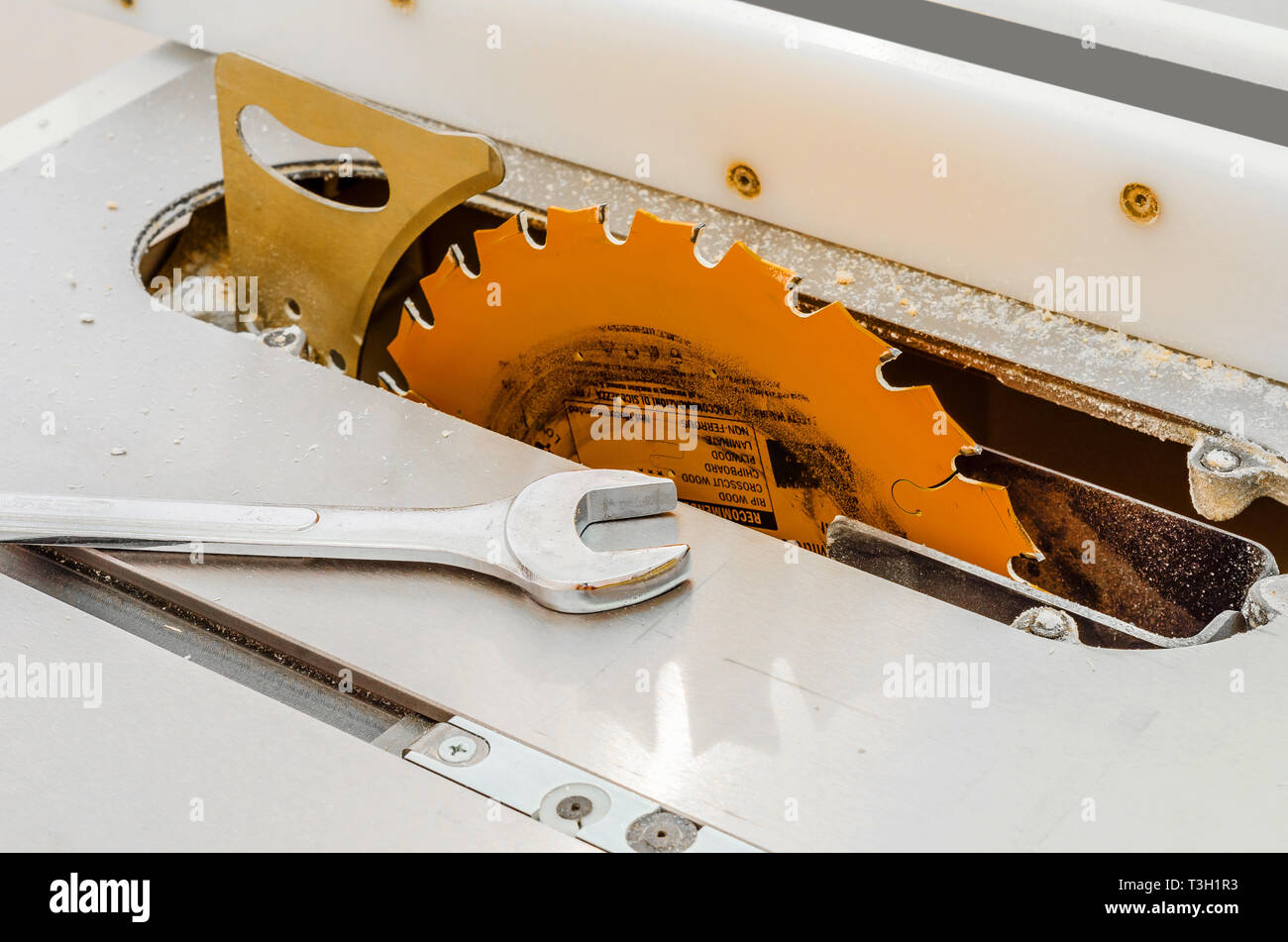 Woodworking, adjustable circular saw, wrench Stock Photo - Alamy