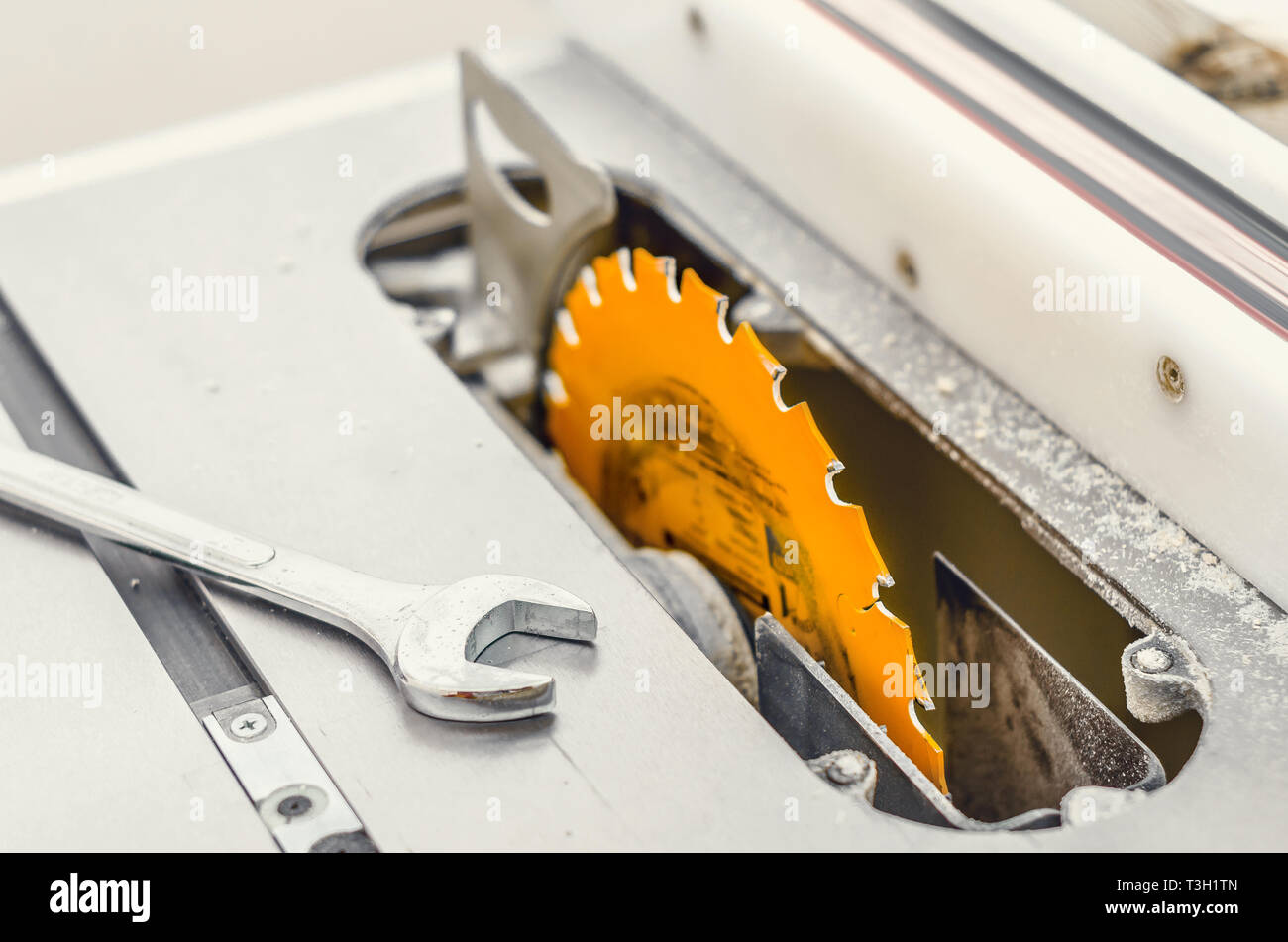 Woodworking, adjustable circular saw, wrench Stock Photo - Alamy