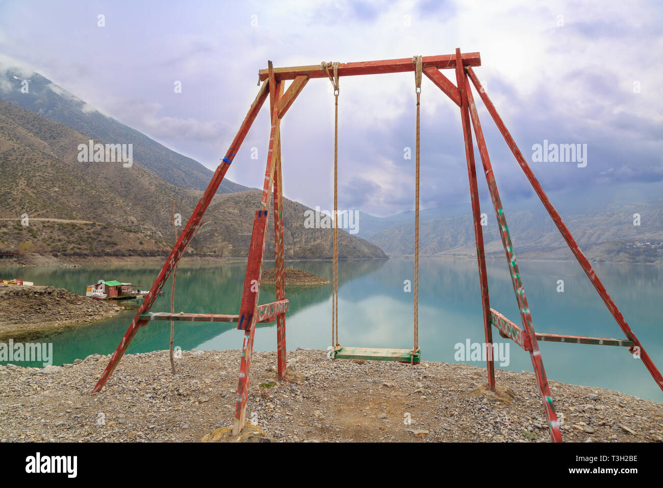 Swing with tortum lake view in Uzundere, Erzurum, Turkey Stock Photo ...