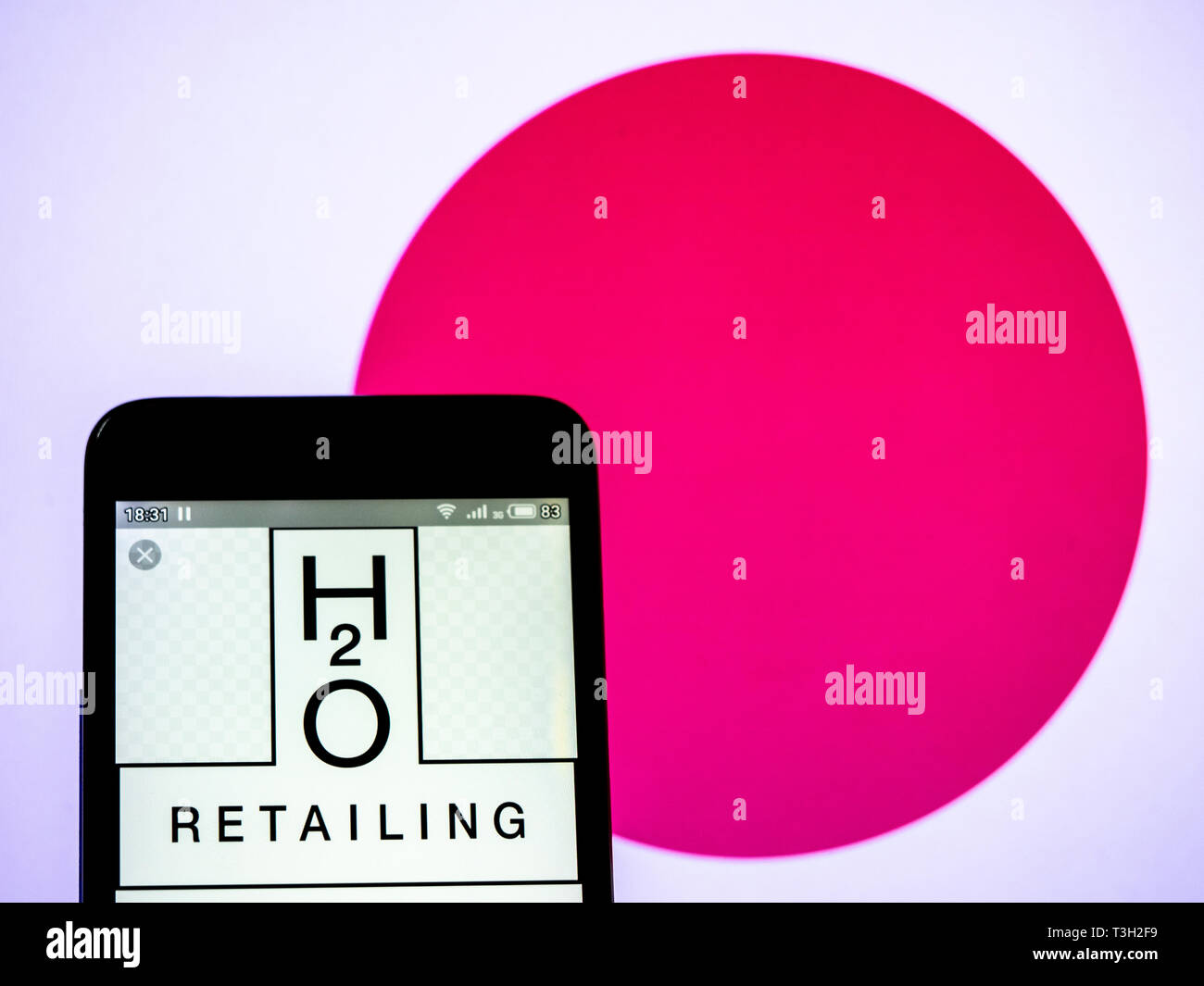 In this photo illustration a H2O Retailing Corporation logo seen displayed on a smart phone ...