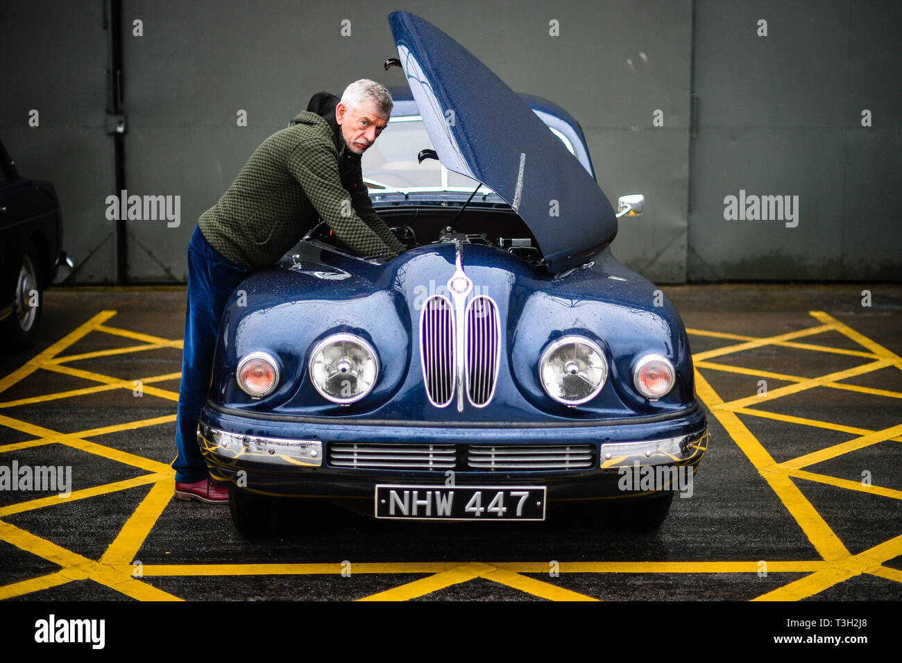 A man checks the engine on his 1950 Bristol 2 Litre as a vintage ...
