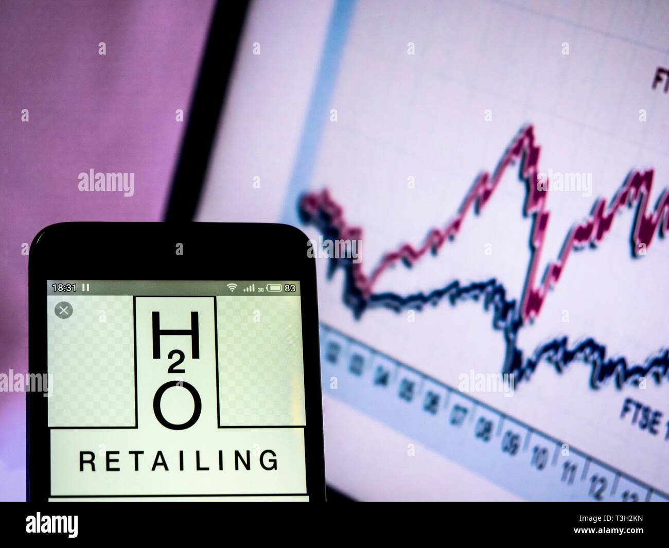 In this photo illustration a H2O Retailing Corporation logo seen displayed on a smart phone ...
