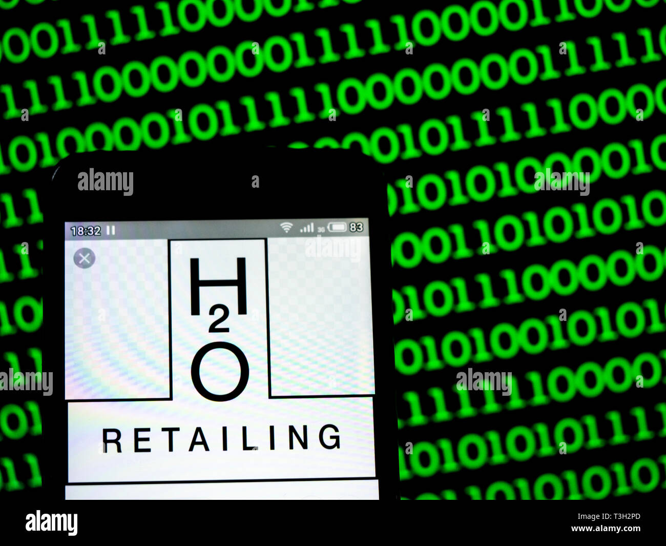 In this photo illustration a H2O Retailing Corporation logo seen displayed on a smart phone ...