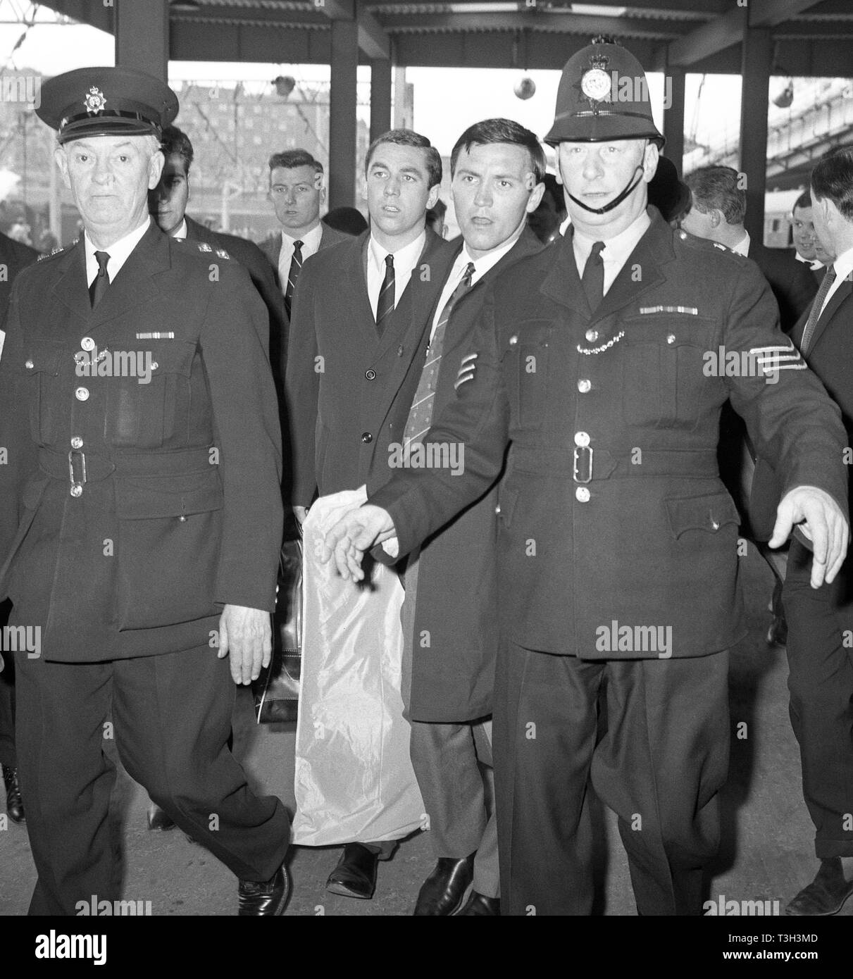 Marvin Hinton (centre) and alongside him Barry Bridges, arriving at ...