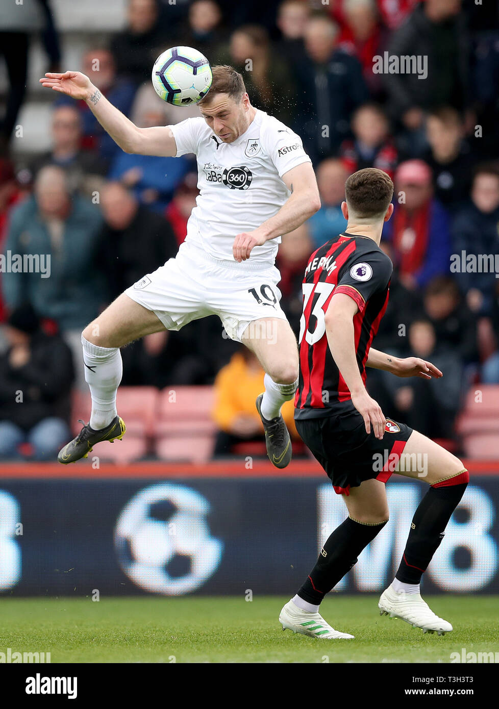 Burnley's Ashley Barnes (left) and Bournemouth's Chris Mepham (right ...
