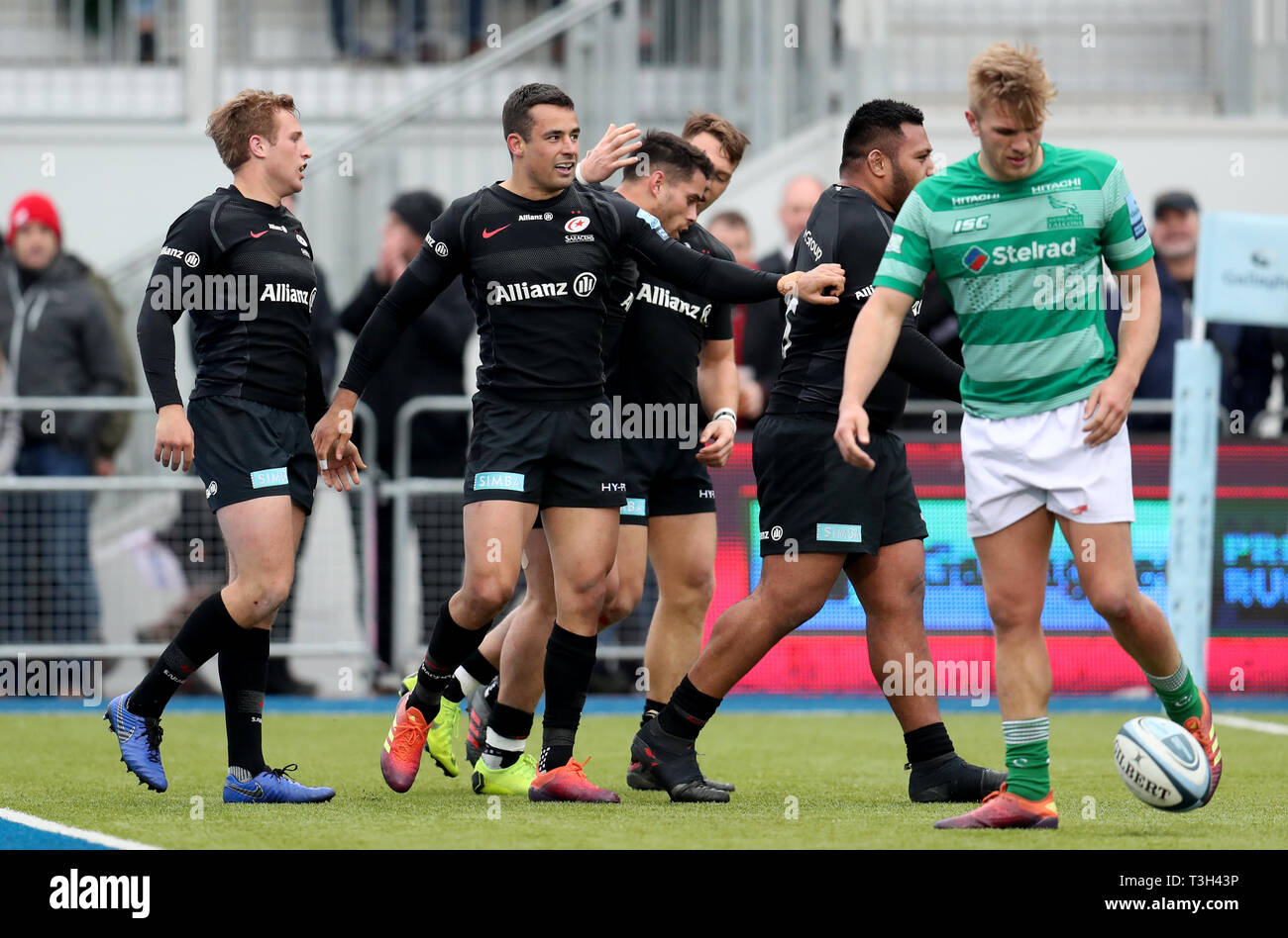 Saracens' Alex Lozowski celebrates with his team mates after scoring a ...