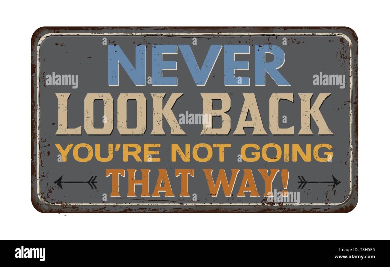 Never look back you're not going that way vintage rusty metal sign on a ...