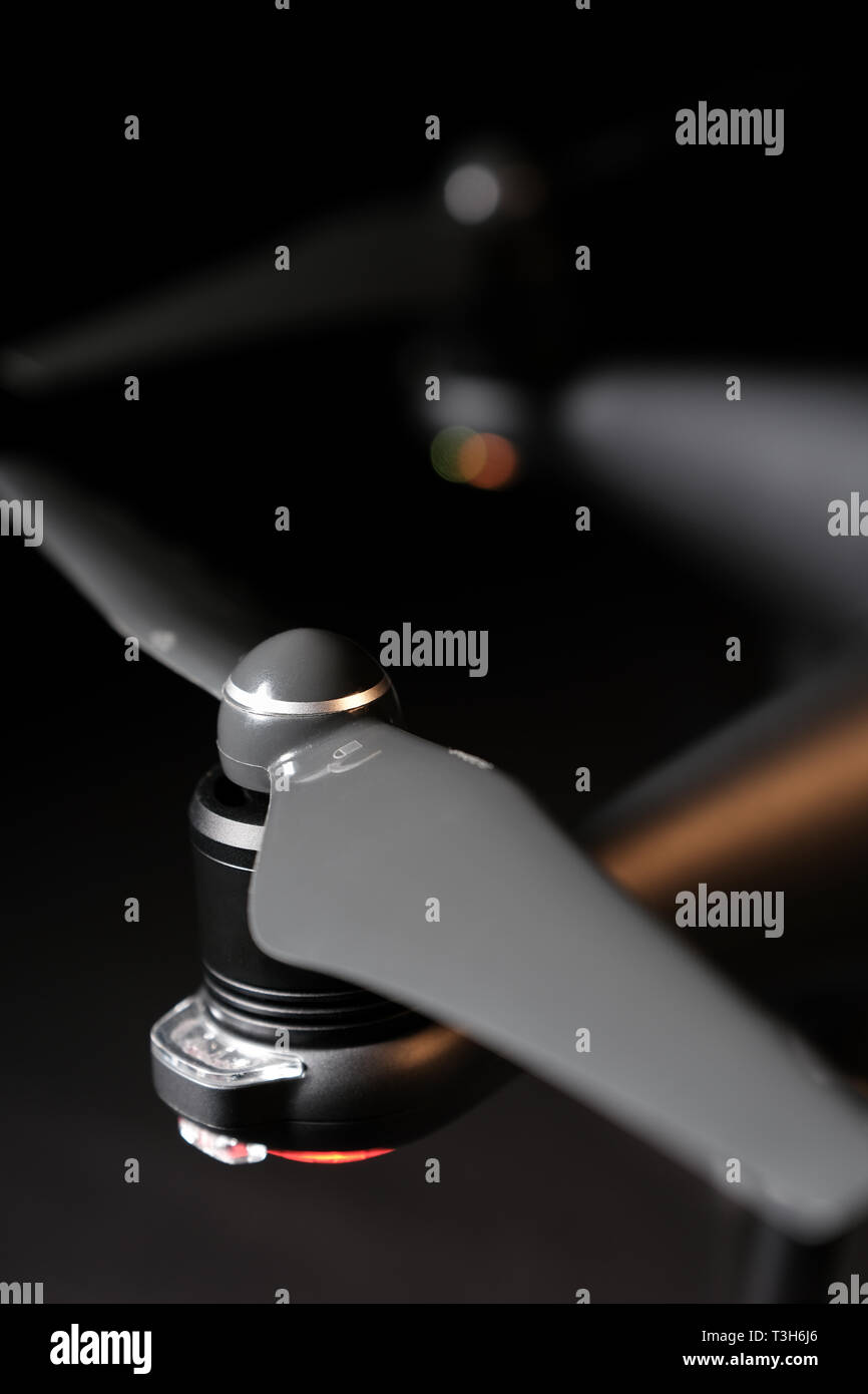 The brushless motor and propeller section of a black DJI Phantom 4 Pro ...
