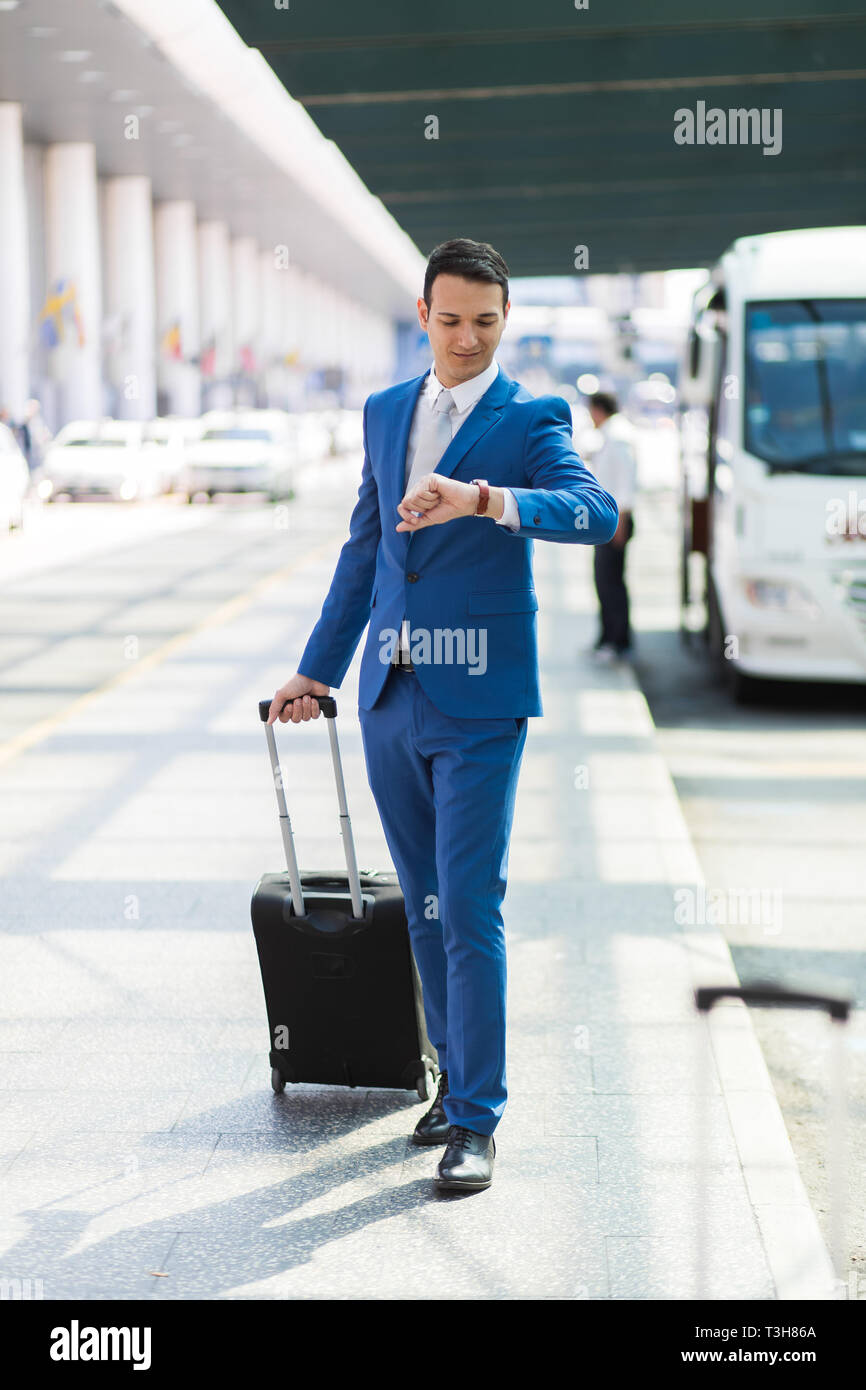 Man pulling trolley hi-res stock photography and images - Alamy
