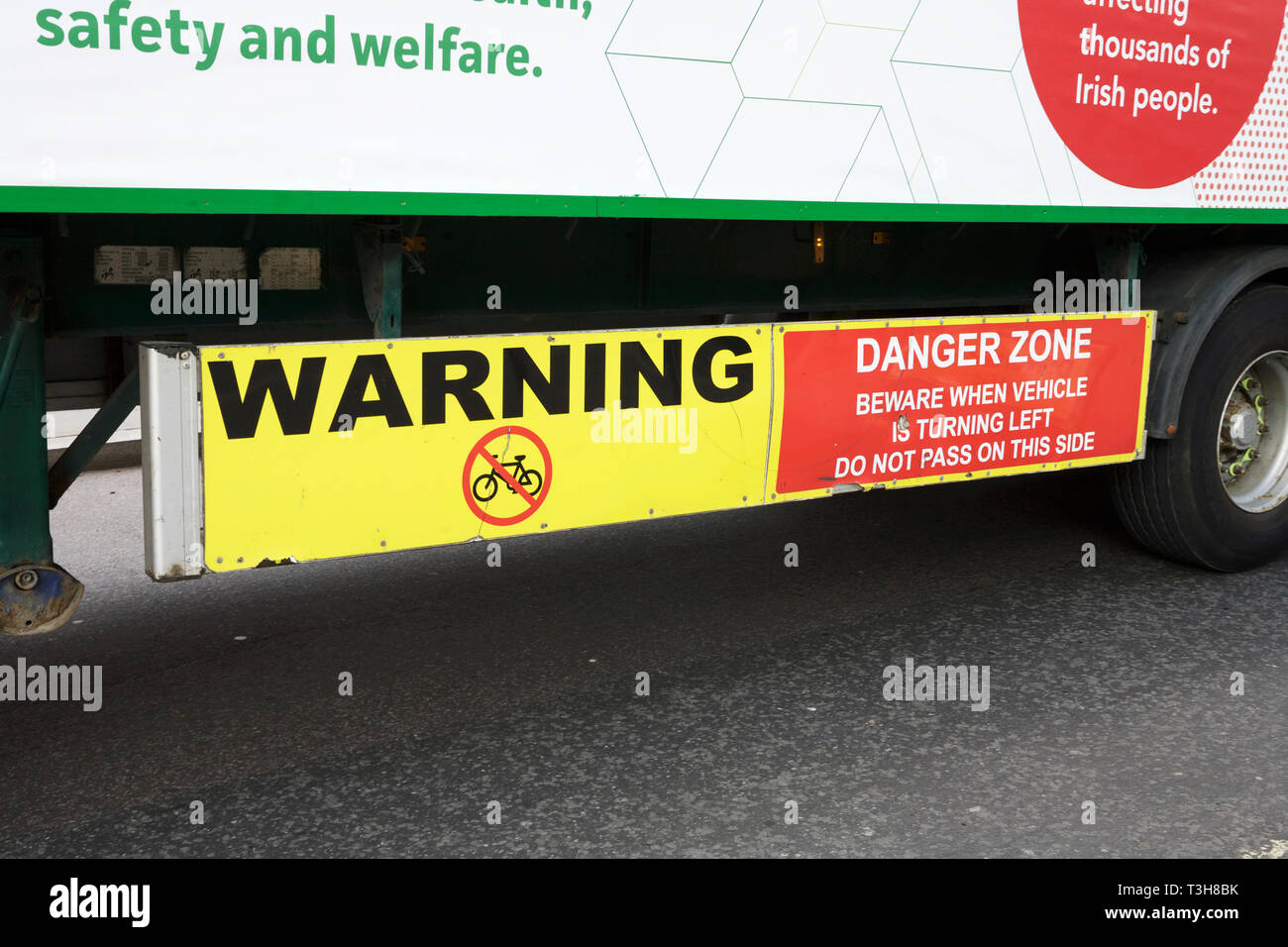 Cyclist, cycle warning sign on side of truck, London, UK. Danger zone ...