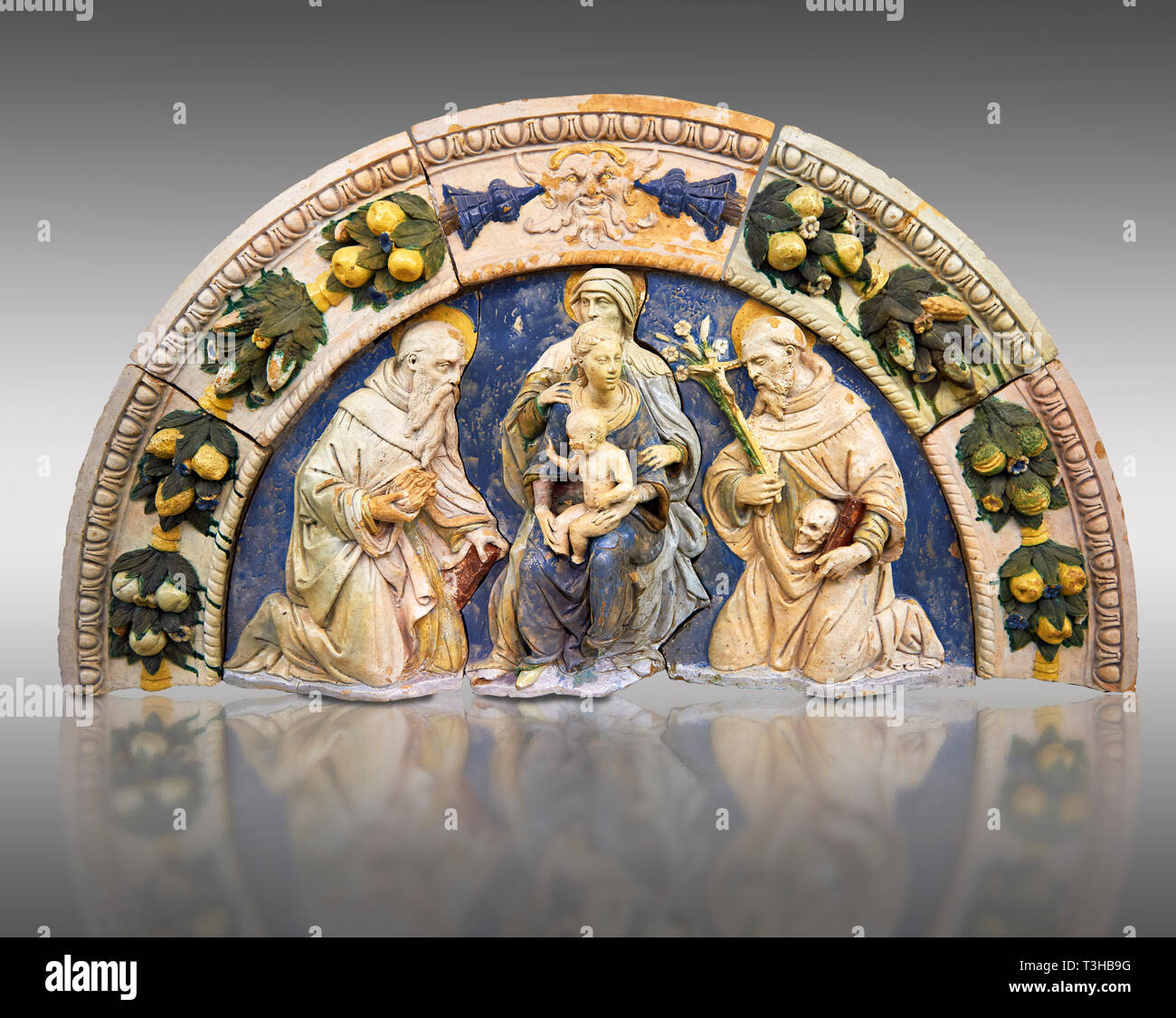 Enamelled terracotta panel depicting Saint Anne, the Virgin Mary and Child with Saint Anthony ...