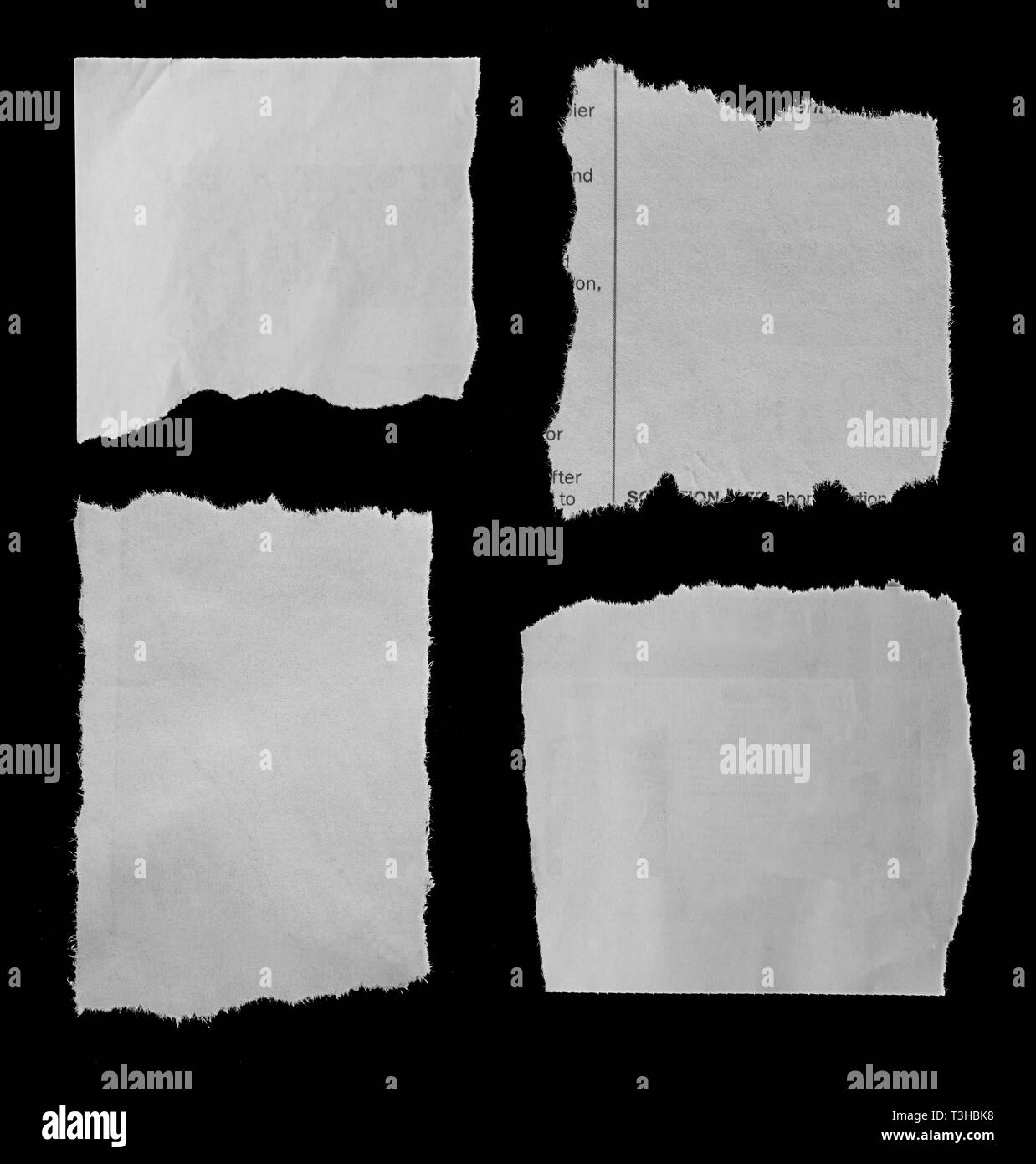Four pieces of torn newspaper on black background Stock Photo - Alamy