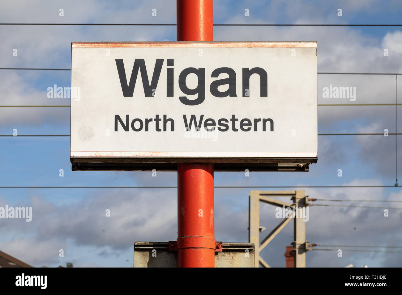 Blue train station sign hi-res stock photography and images - Alamy