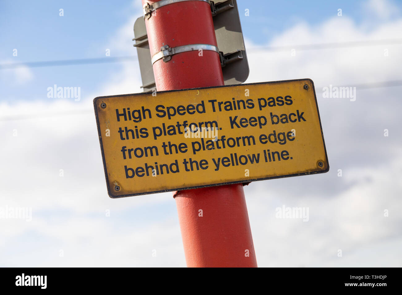 High speed trains pass this platform sign at Wigan North Western ...