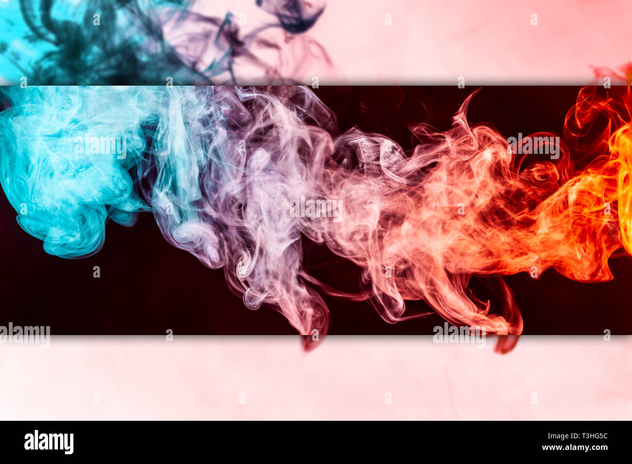 Abstract art colored red and blue smoke on black isolated background ...