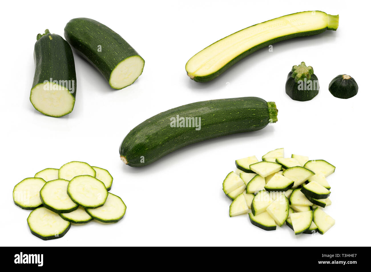 Set of fresh whole and sliced zucchini - isolated on white Stock Photo ...