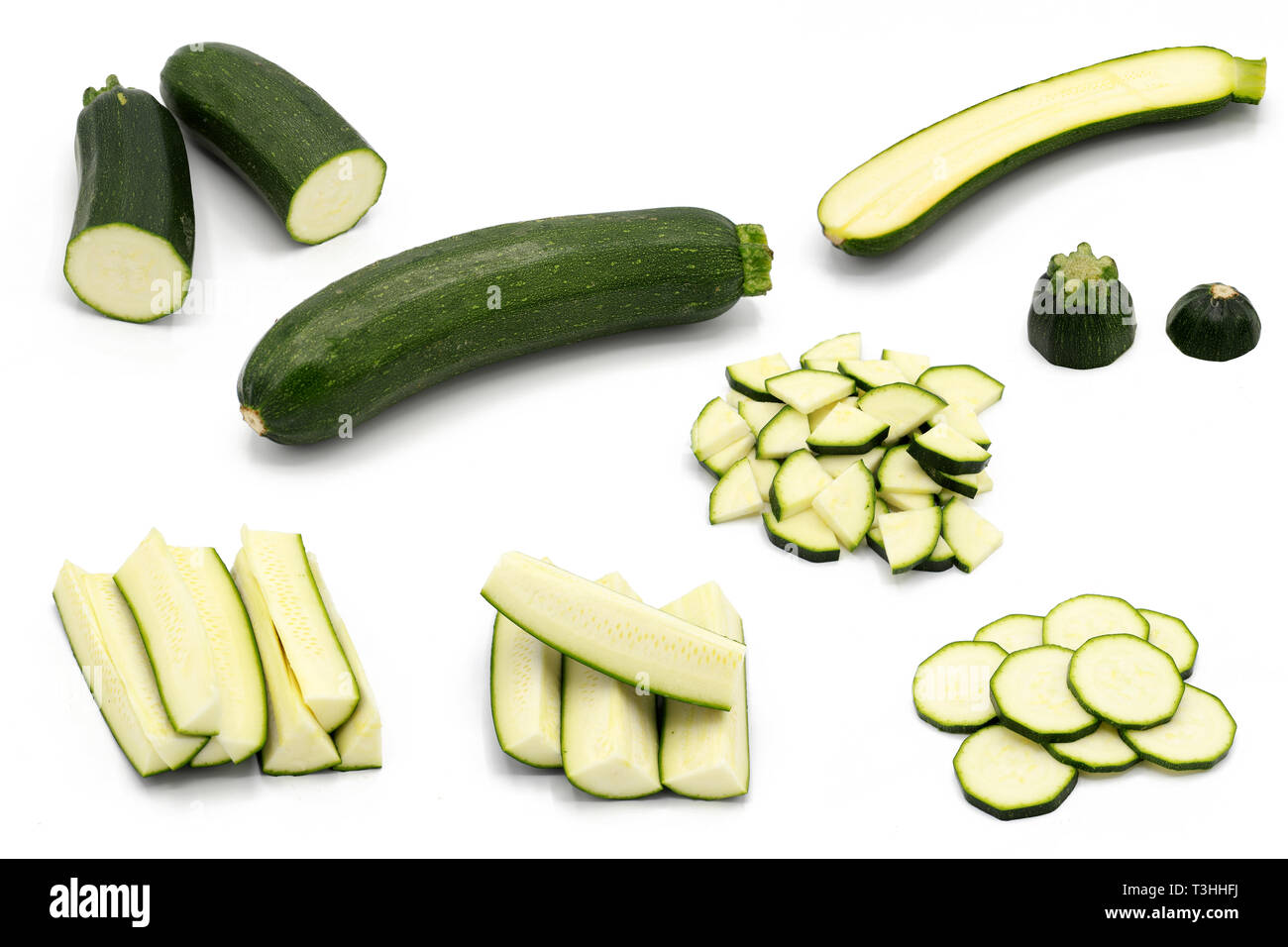 Set of fresh whole and sliced zucchini - isolated on white Stock Photo ...