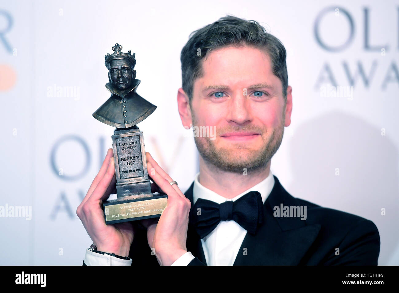 Kyle Soller with the Best actor award, in The Inheritance, presented by ...