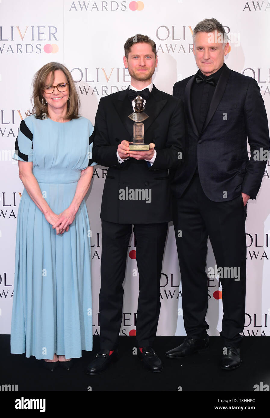 Kyle Soller with the Best actor award, in The Inheritance, presented by ...