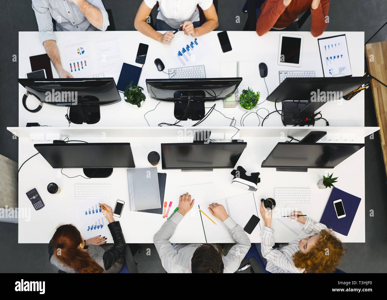 Young team working on computers at modern office Stock Photo - Alamy