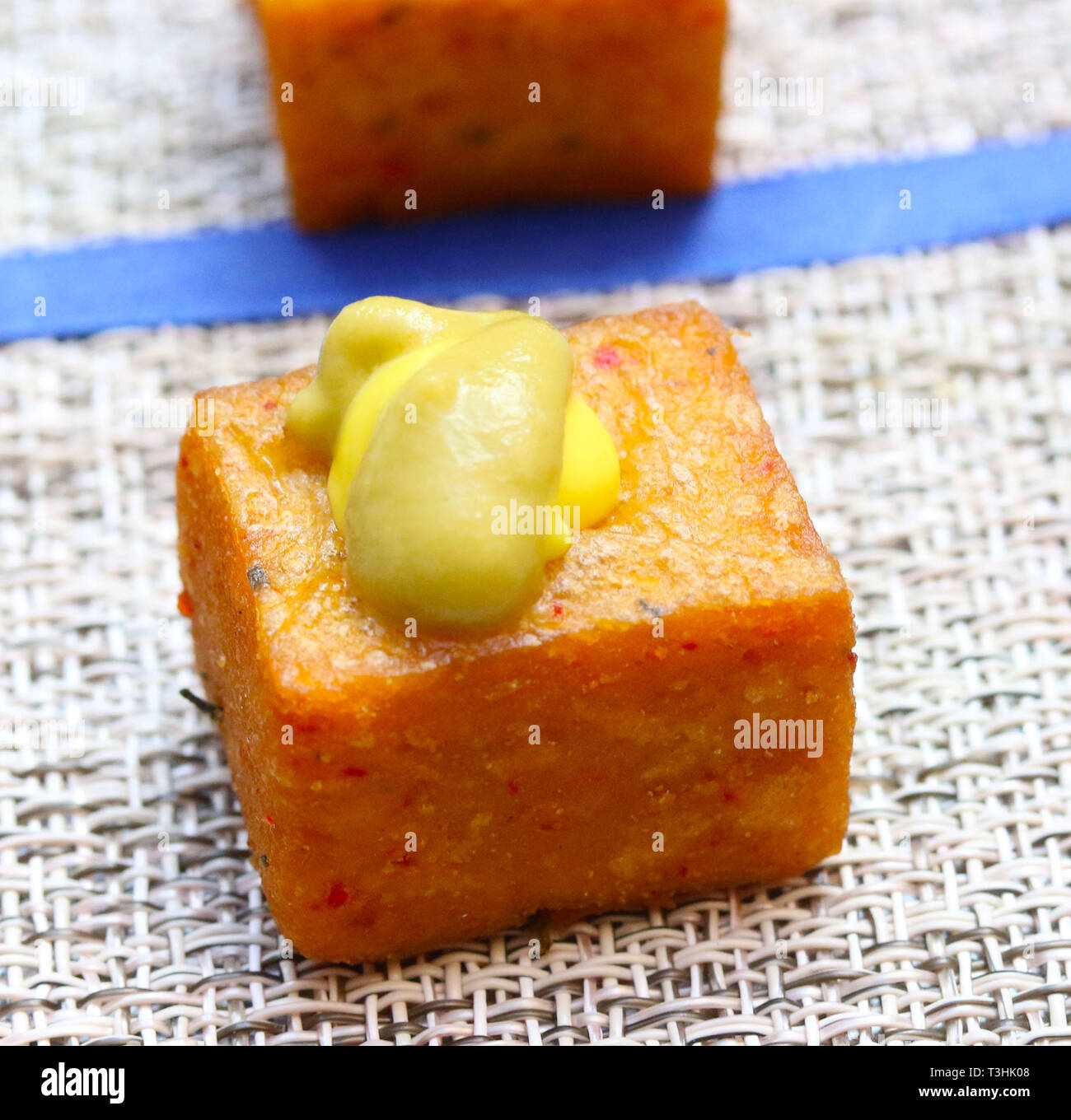 Chickpea appetizers with a mustard drop on crystal glass dish Stock ...