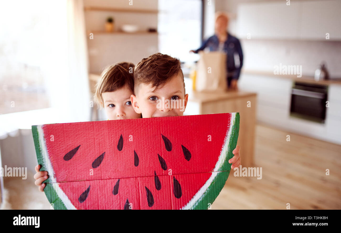 Two happy children playing at home. Copy space Stock Photo - Alamy