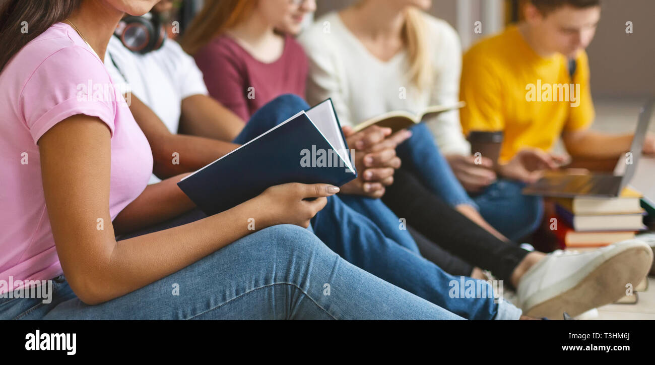 Group of international student studying in library Stock Photo - Alamy