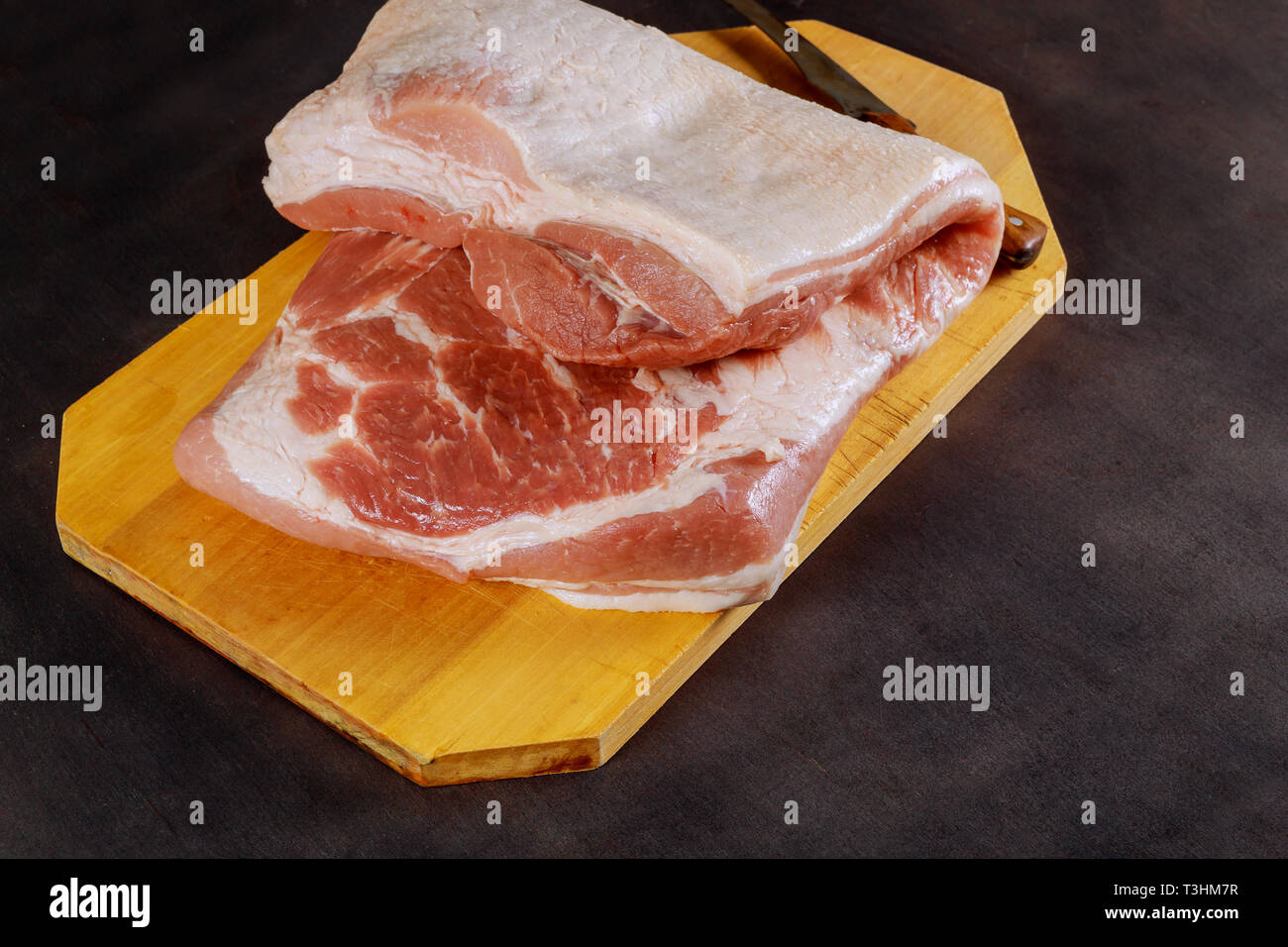 Top view raw pork chop on wooden background with free text space Stock ...