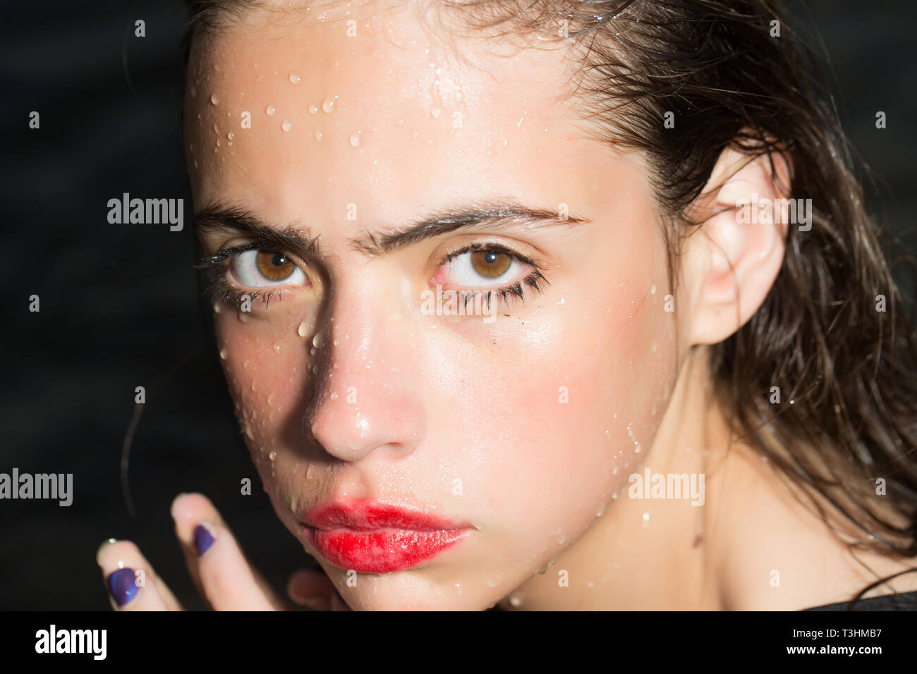 Model girl wet swimsuit hi-res stock photography and images - Alamy
