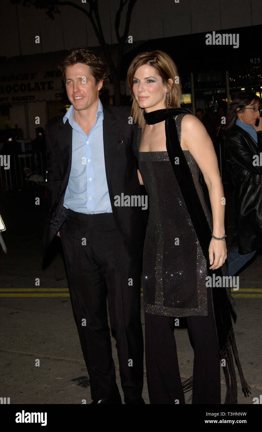 LOS ANGELES, CA. December 18, 2002: Actor HUGH GRANT & actress SANDRA ...
