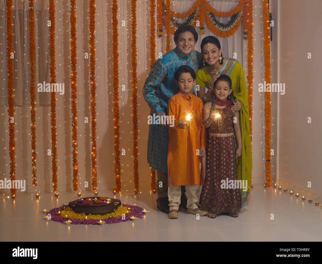 Portrait indian family celebrating diwali hi-res stock photography and ...