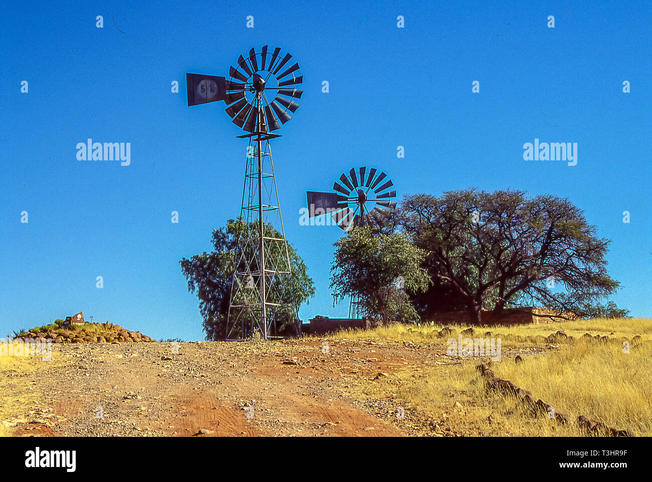 Mills for raising water from a well in Namibia Stock Photo - Alamy