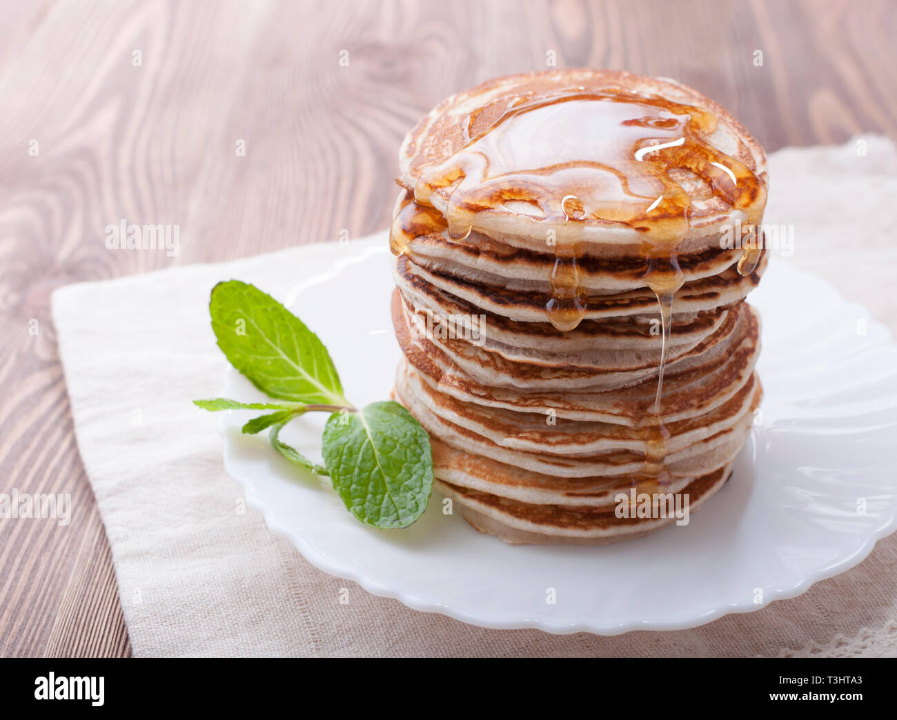 Pancakes for breakfast with honey, American pancakes Stock Photo - Alamy