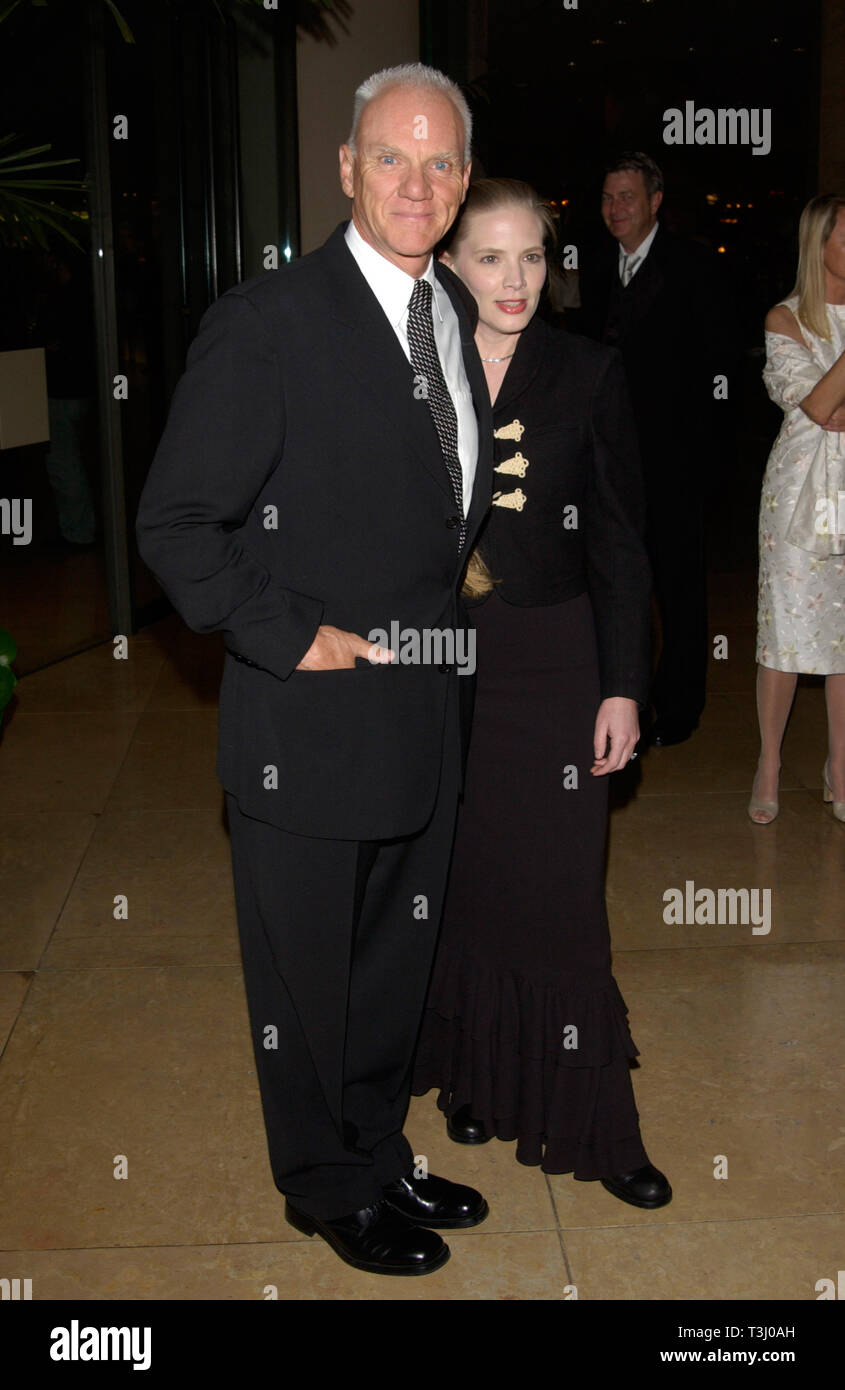 LOS ANGELES, CA. April 12, 2002: Actor MALCOLM McDOWELL & wife at the ...