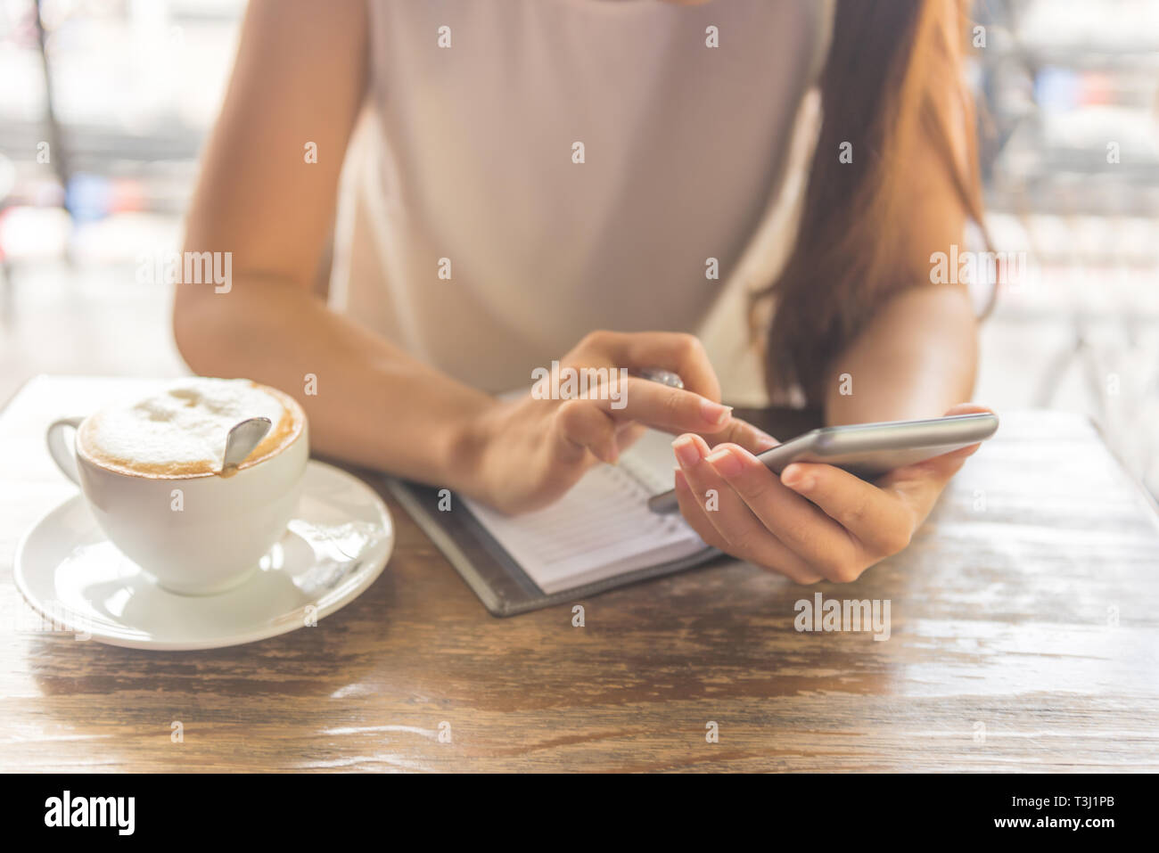Female hand using phone to check email Stock Photo - Alamy