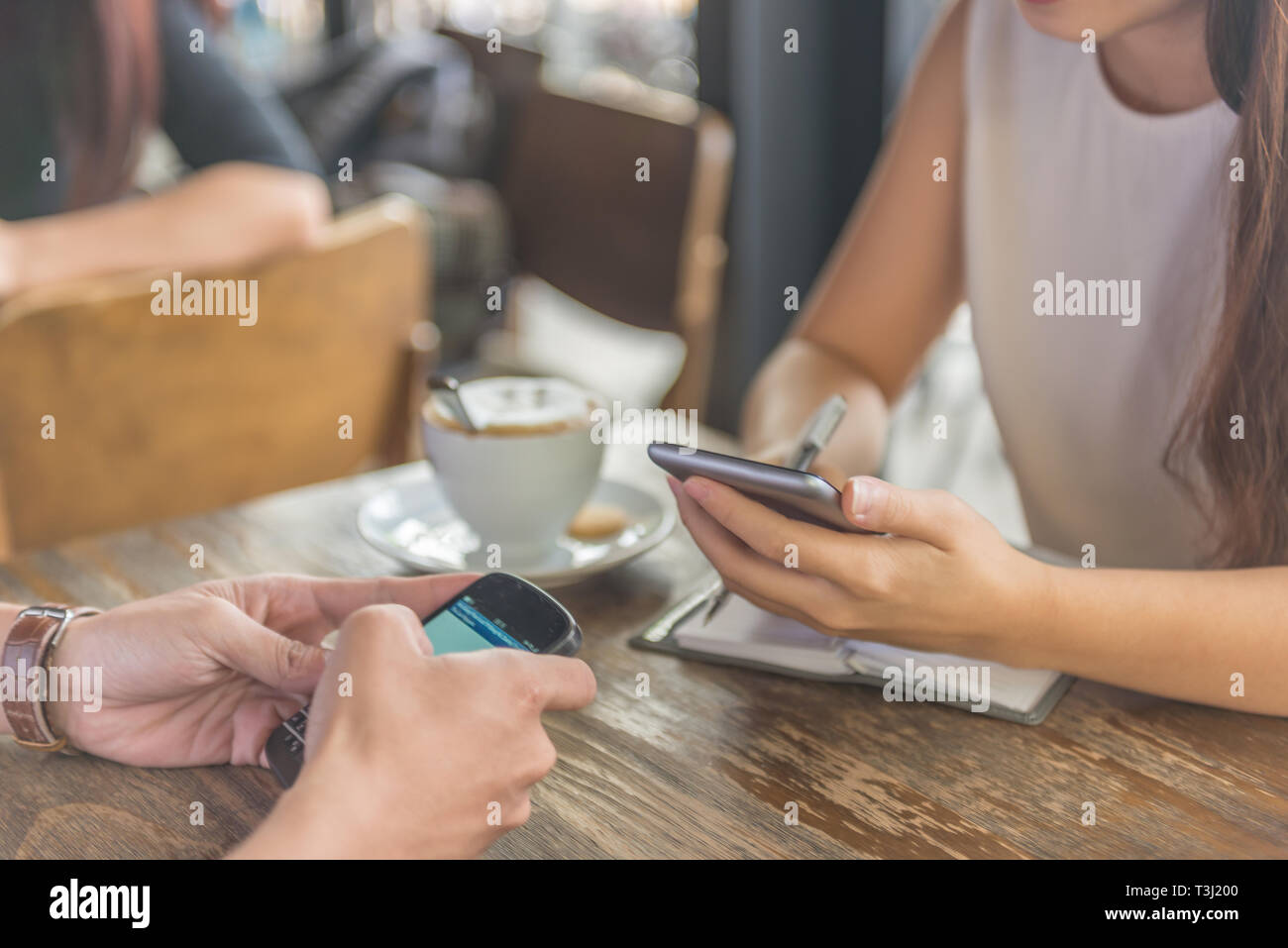 Business team working using phone to check email Stock Photo - Alamy