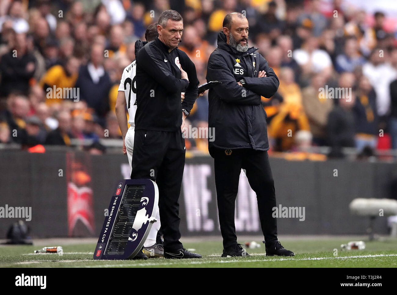 Wolverhampton Wanderers manager Nuno Espirito Santo (right) looks on ...